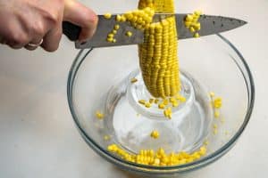Charred Corn Salad with Sun-Dried Tomatoes & Parmesan - No Frills Kitchen